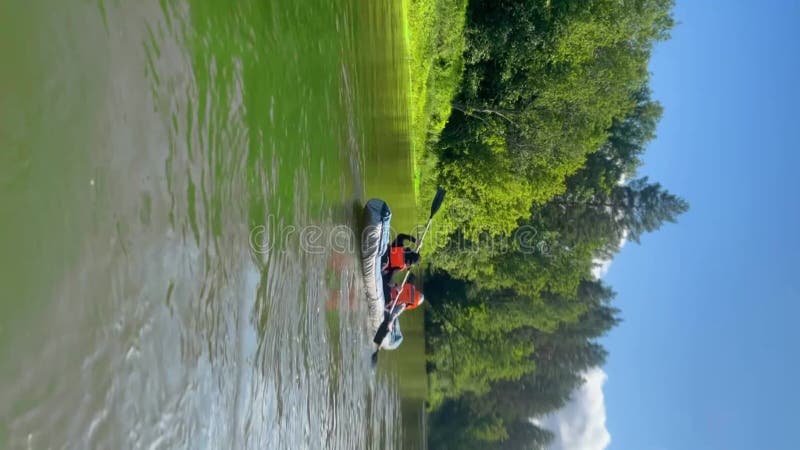 Guys, Young Women and Men Raft Down the River in Summer Stock Footage ...
