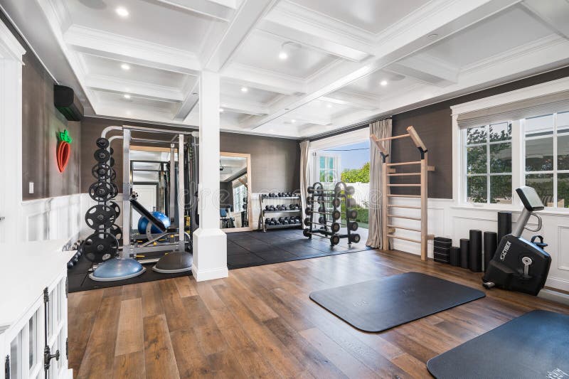 A Gym with Various Equipment Including Equipment Like Treadmill and ... A Gym with Various Equipment Including Equipment Like Treadmill and ...