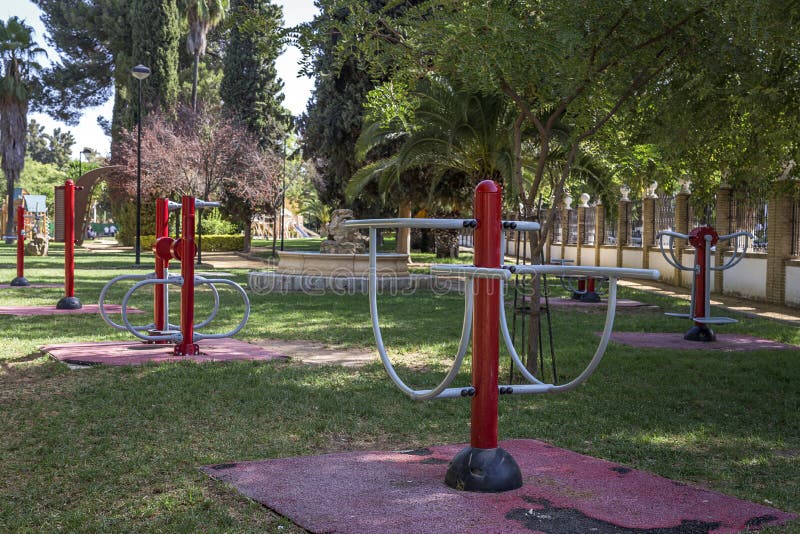 Gym equipment in park stock image. Image of grassy, health - 98619801