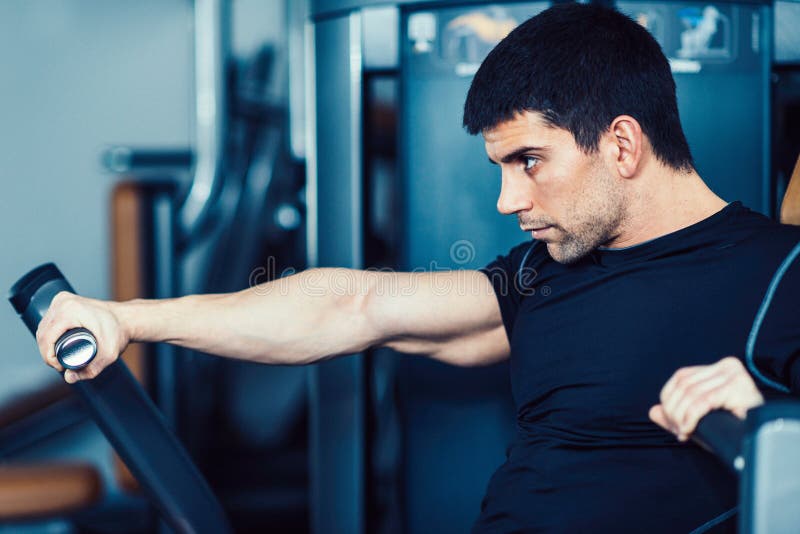 Gym exercising stock image. Image of human, muscles - 222774427