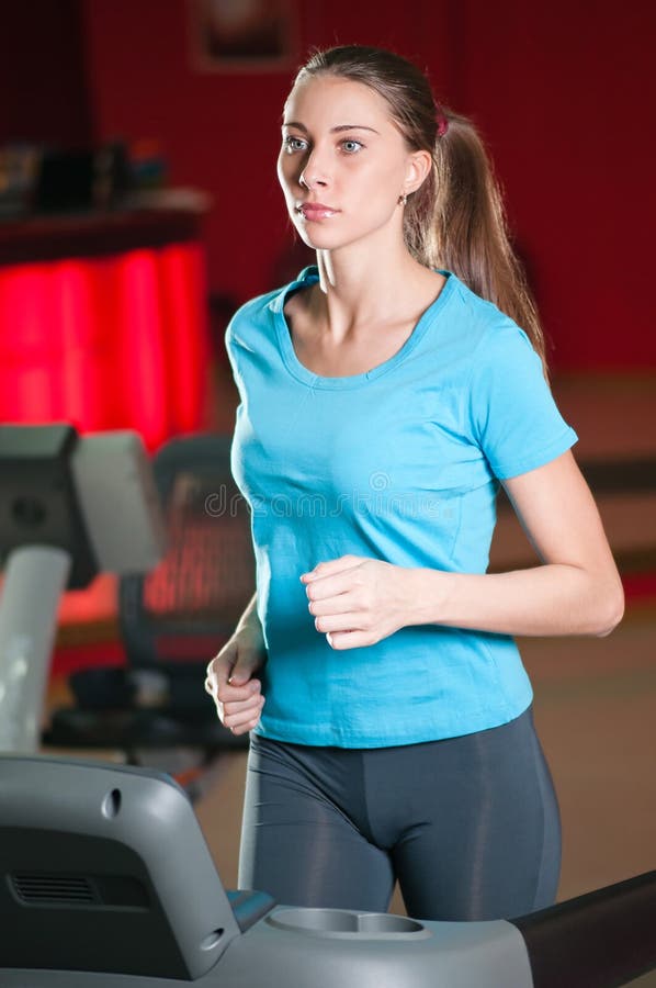 Gym Exercising. Run on on a Machine Stock Image - Image of leisure ...