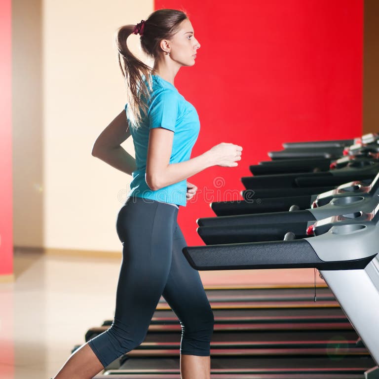 Gym Exercising. Run on on a Machine Stock Photo - Image of happy ...