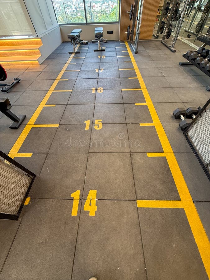 A Gym Floor with Yellow Lines and Numbers on it Stock Photo - Image of ...