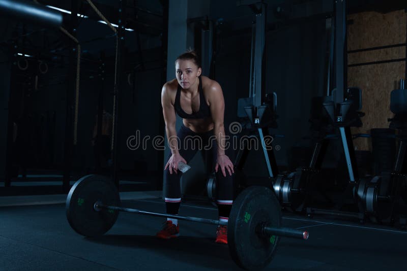 Gym hard training woman stock image. Image of barbell - 91804655