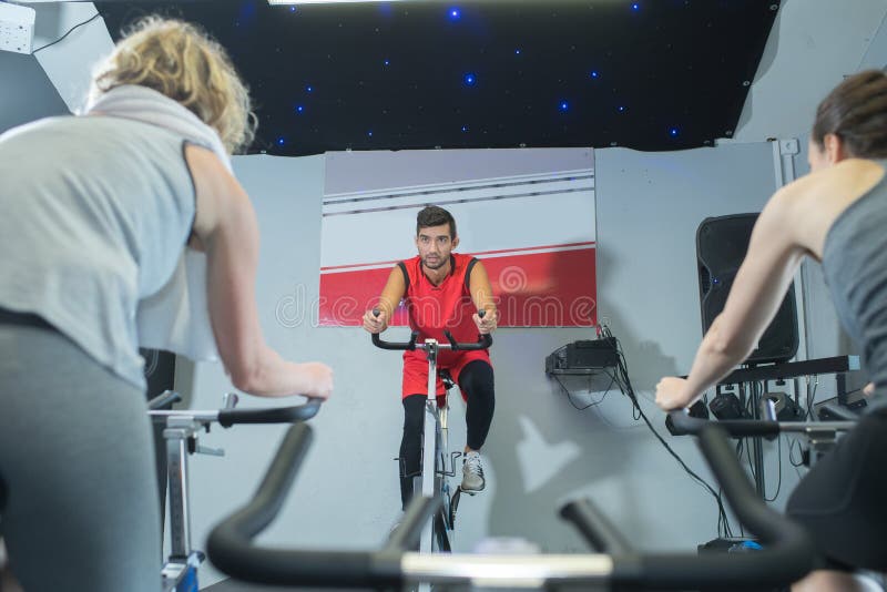 Gym Members Participating in Spinning Class Stock Photo - Image of ...