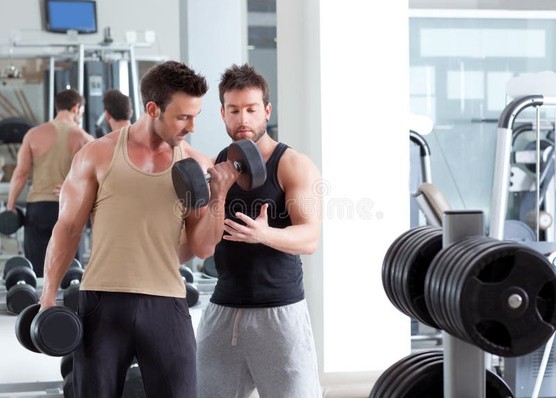 Gym Personal Trainer Man with Weight Training Stock Image - Image of ...