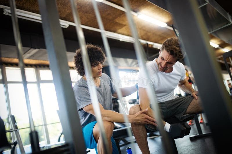 Gym Personal Trainer Man with Weight Training Equipment Stock Image ...