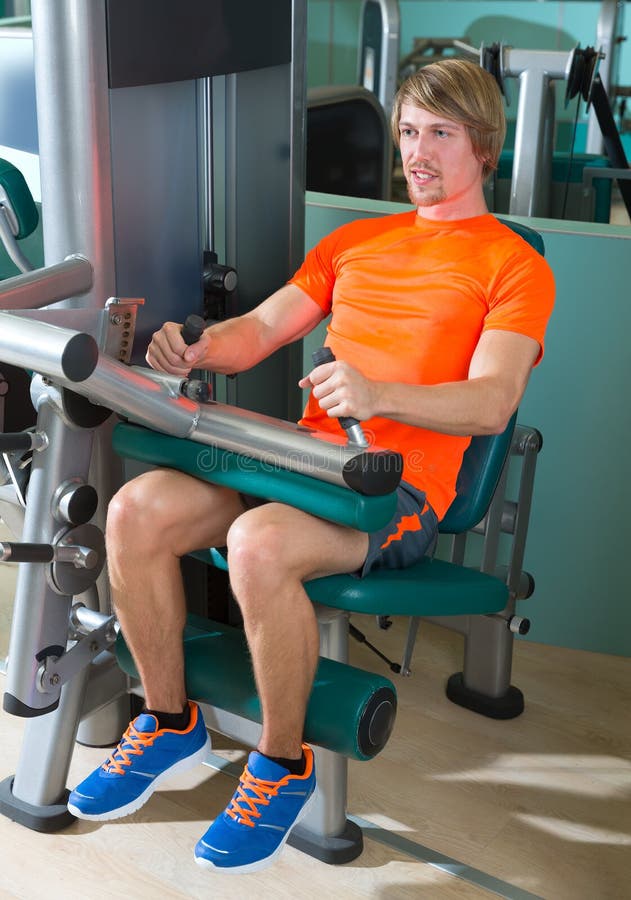 Gym Seated Leg Curl Machine Exercise Blond Man Stock Image - Image of ...