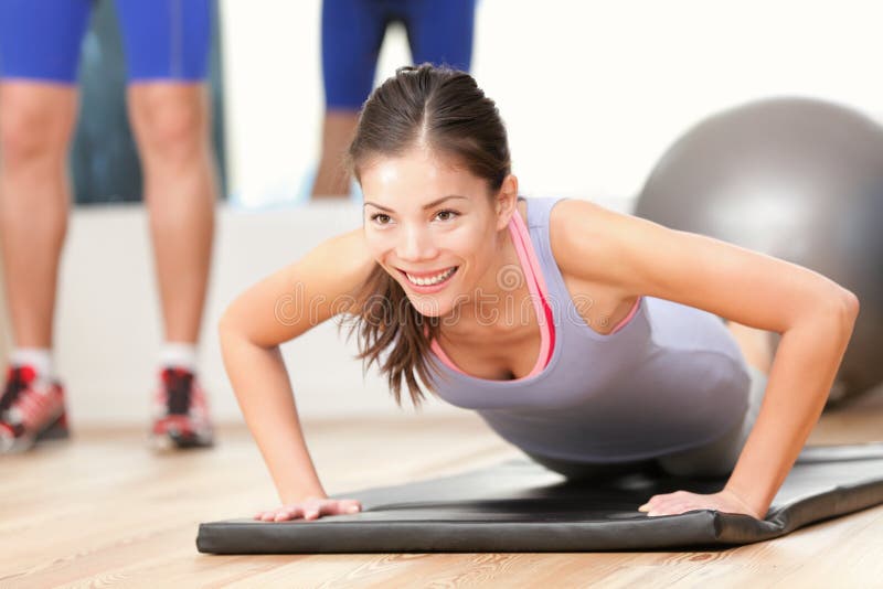 Gym woman working out stock image. Image of exercising - 23634293
