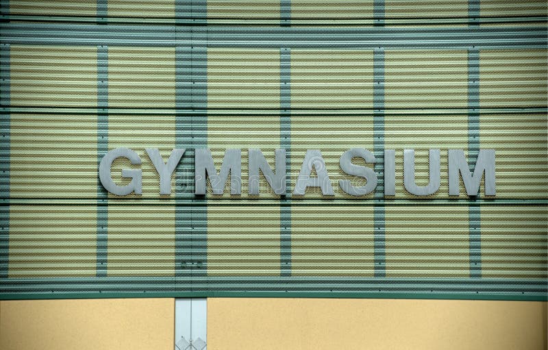 Gymnasium Sign on Brick Wall Stock Photo - Image of fitness, building ...