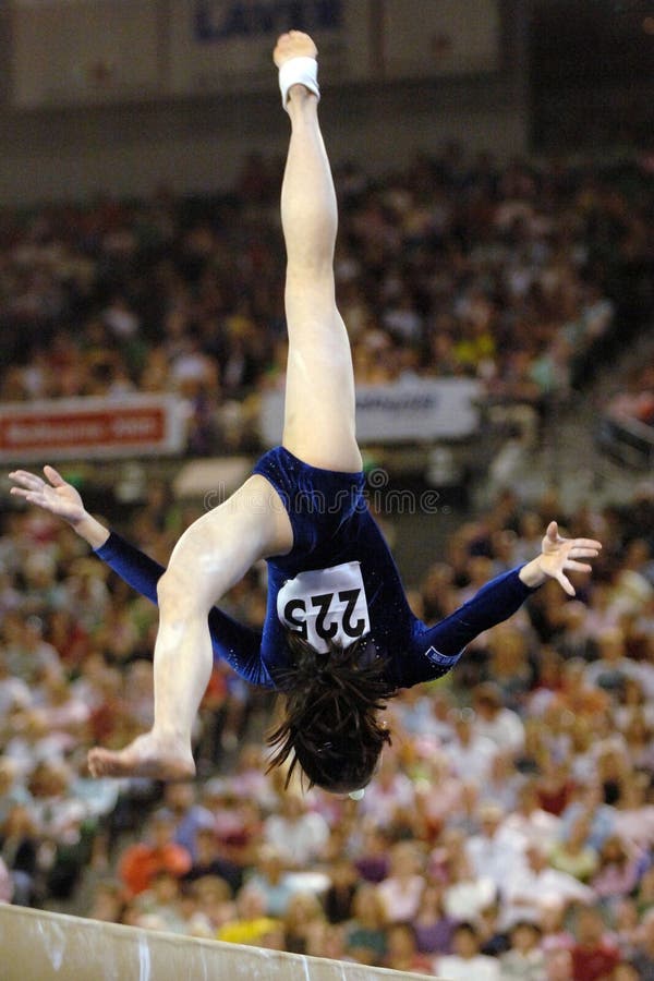 Gymnast beam 01 stock image. Image of competition, leaps - 1961345