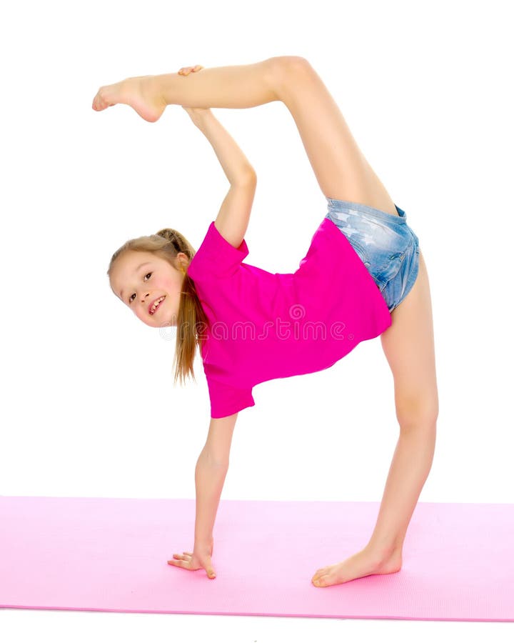 The Gymnast Perform an Acrobatic Element on the Floor. Stock Image ...