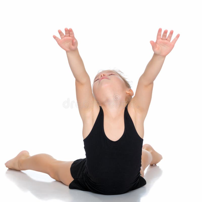 The Gymnast Perform an Acrobatic Element on the Floor. Stock Photo ...