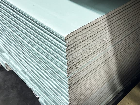 Gypsum Board Sheets in a Stack Stock Photo - Image of repair, hardware ...