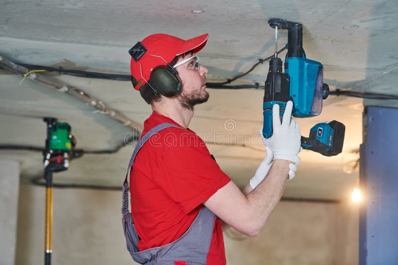 Gypsum Plasterboard Work. Drywall Construction at Home. Contractor ...