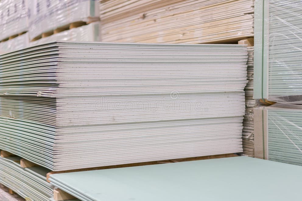Gypsum Plasterboard in the Pack. the Stack of Gypsum Board Preparing ...