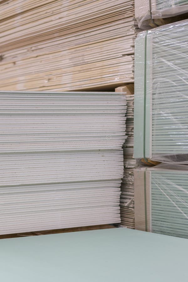 Gypsum Plasterboard in the Pack. the Stack of Gypsum Board Preparing ...
