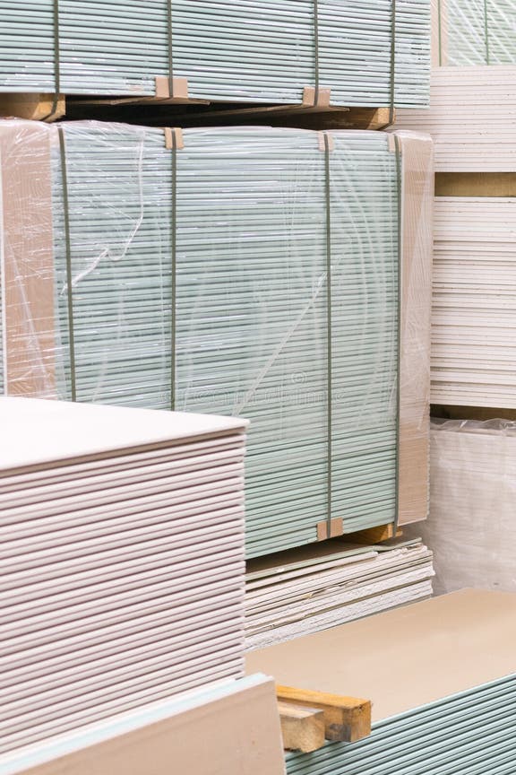 Gypsum Plasterboard in the Pack. the Stack of Gypsum Board Preparing ...