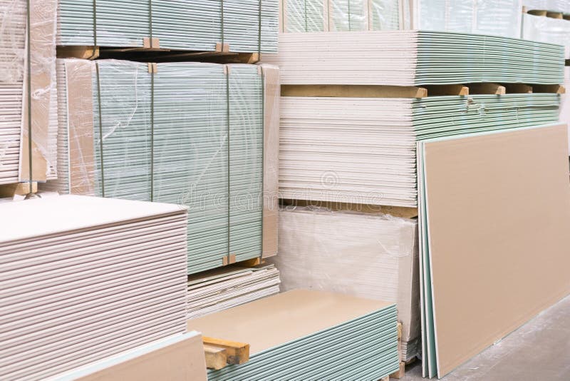 Gypsum Plasterboard in the Pack. the Stack of Gypsum Board Preparing ...