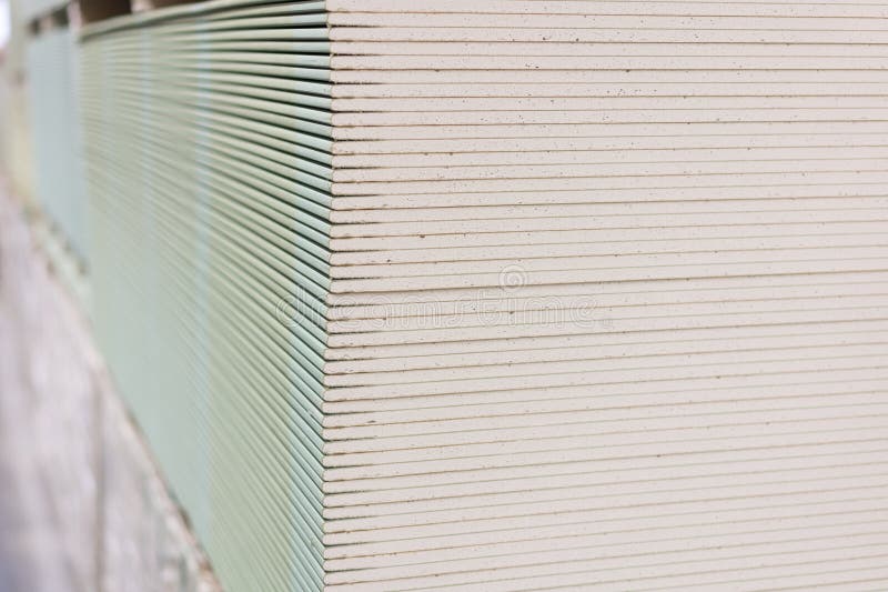 Gypsum Plasterboard in the Pack. the Stack of Gypsum Board Preparing ...