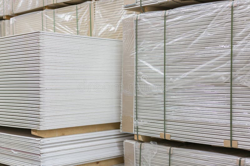 Gypsum Plasterboard in the Pack. the Stack of Gypsum Board Preparing ...
