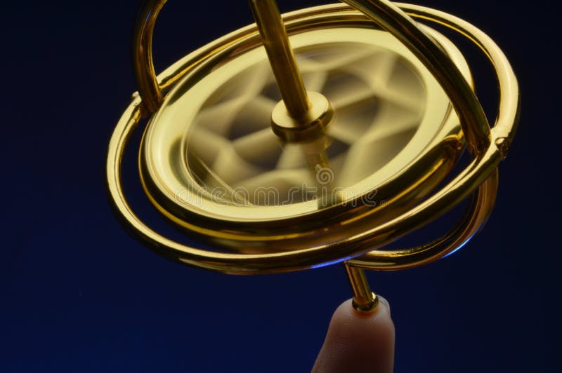 Gyroscope Balanced on Finger Tip Stock Photo - Image of spinning ...