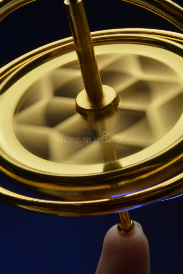 Gyroscope Balanced on Finger Tip Stock Photo - Image of whirl, harmony ...