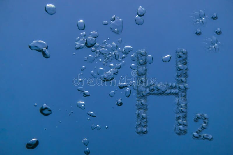 Hydrogen H2 Letters with Brown Leaves Like a Tree on a Green Meadow ...