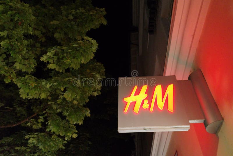 H&M sign at night editorial stock image. Image of shop - 157696594