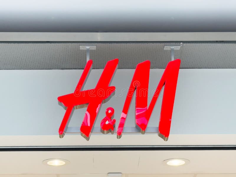 H M Storefront Signage: Bold Red Logo on Modern Retail Facade Editorial ...