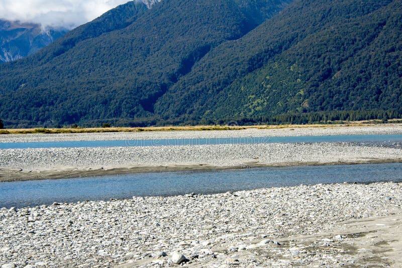 Haast River stock image. Image of stream, forest, lake - 321273721