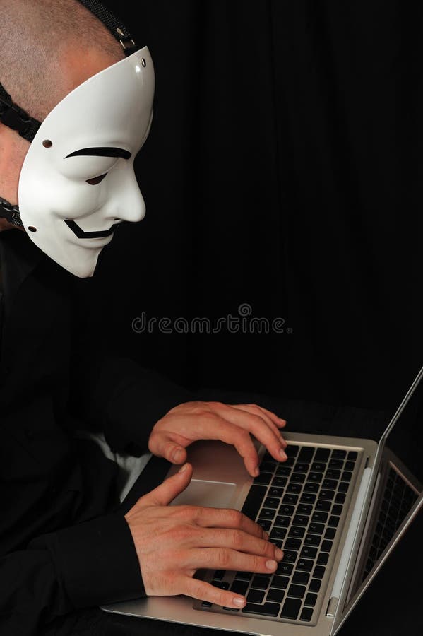 Business Man in White Mask Wearing Gloves and Using Computer - Fraud ...