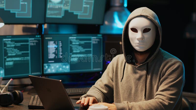 Hacker with Anonymous Mask Breaking Security System Stock Photo - Image of cybercrime, hardware ...