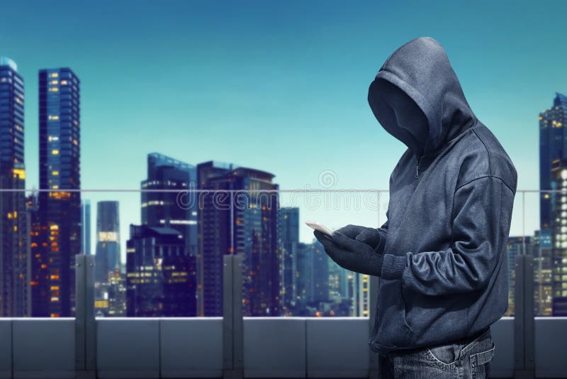 Hacker Anonymous Using Smartphone on the Street Stock Image - Image of ...