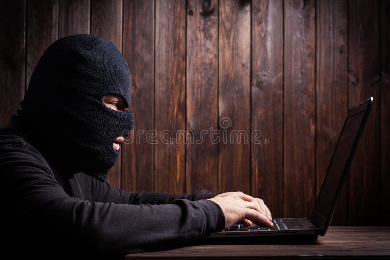 Hacker in a balaclava stock photo. Image of download - 42078994