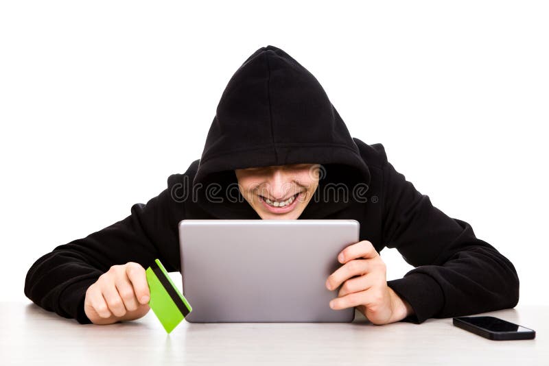 Hacker with a Bank Card stock photo. Image of hoodie - 128247716