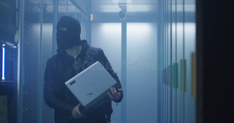 Hacker Breaking Server Software and Destroying Computers Stock Image ...