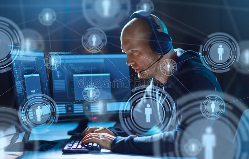 Hacker with Computer and Headset in Dark Room Stock Photo - Image of ...