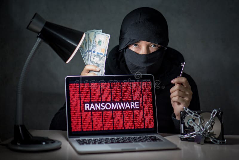 Hacker with Computer Screen Showing Ransomware Attacking Stock Image ...