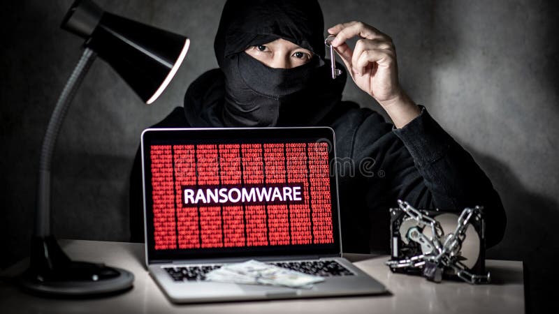 Hacker with Computer Screen Showing Ransomware Attacking Stock Photo ...