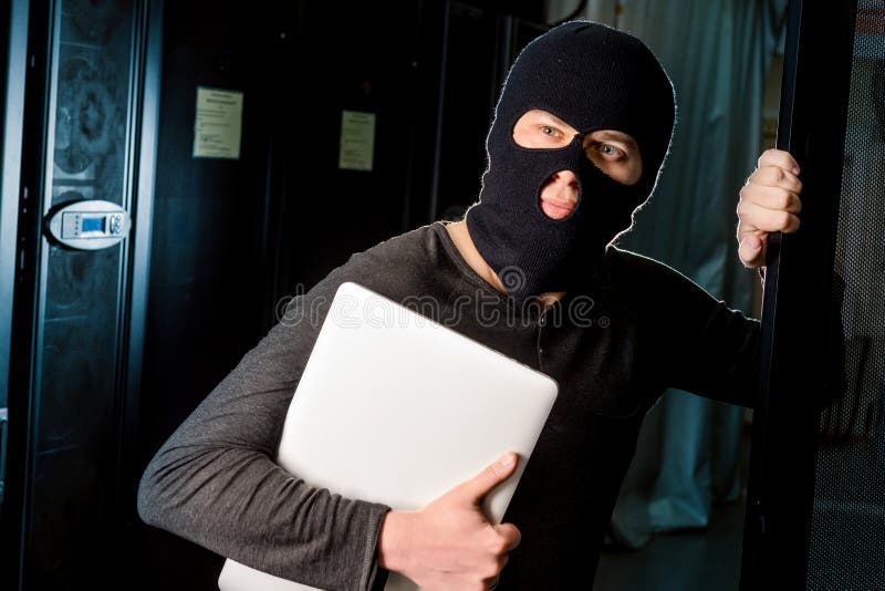Hacker in a datacenter stock photo. Image of crine, data - 67444088