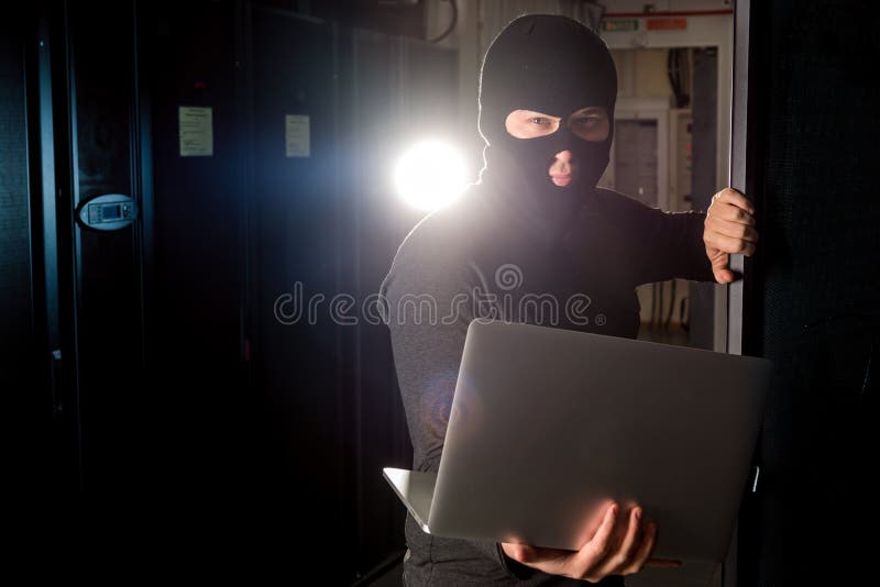 Hacker in a datacenter stock photo. Image of backup, attack - 67504640
