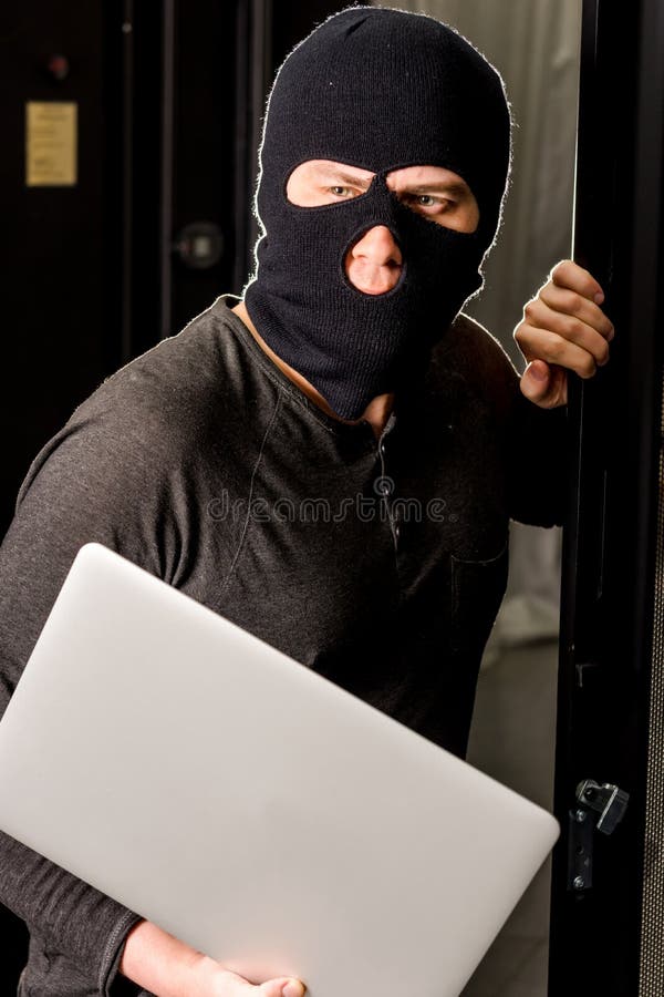 Hacker in a datacenter stock photo. Image of center, male - 67817670