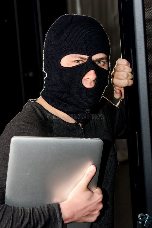 Hacker in a datacenter stock photo. Image of internet - 67880394