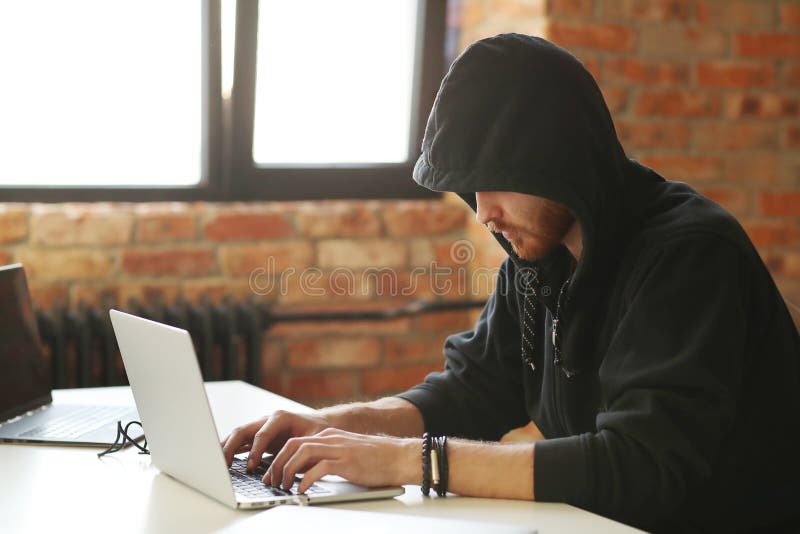 Hacker stock photo. Image of criminal, hiding, daytime - 91319684