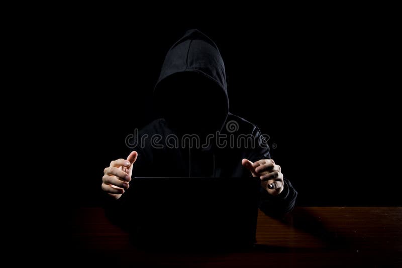 Hacker In Front Of His Computer. Dark Face Stock Image - Image of ...