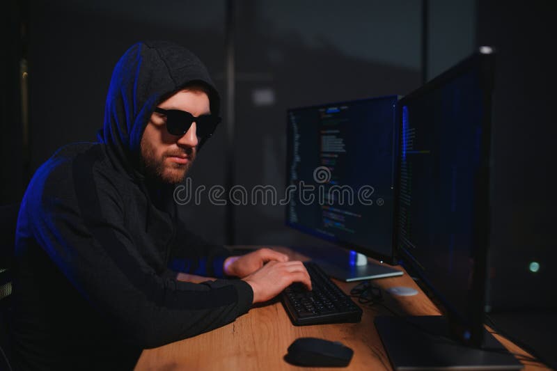 Hacker is Hacking into the Computer Network. Computer Criminal Stock ...