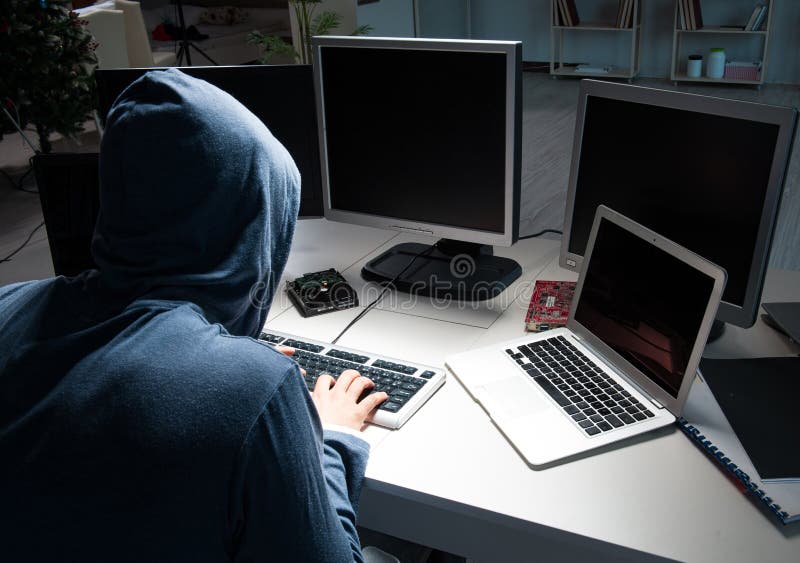 The Scary Hacker Hacking Security Firewall Late In Office Stock Photo ...