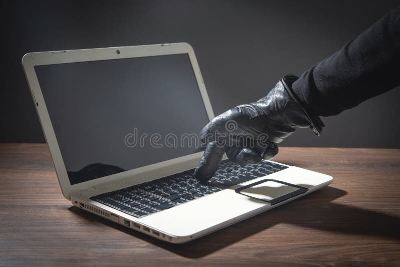 Hacker Hand in a Leather Glove with a Computer Stock Image - Image of ...