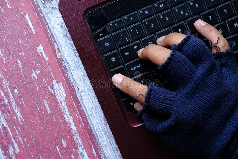 Hacker Hand Typing on Laptop Stealing Data Stock Photo - Image of ...